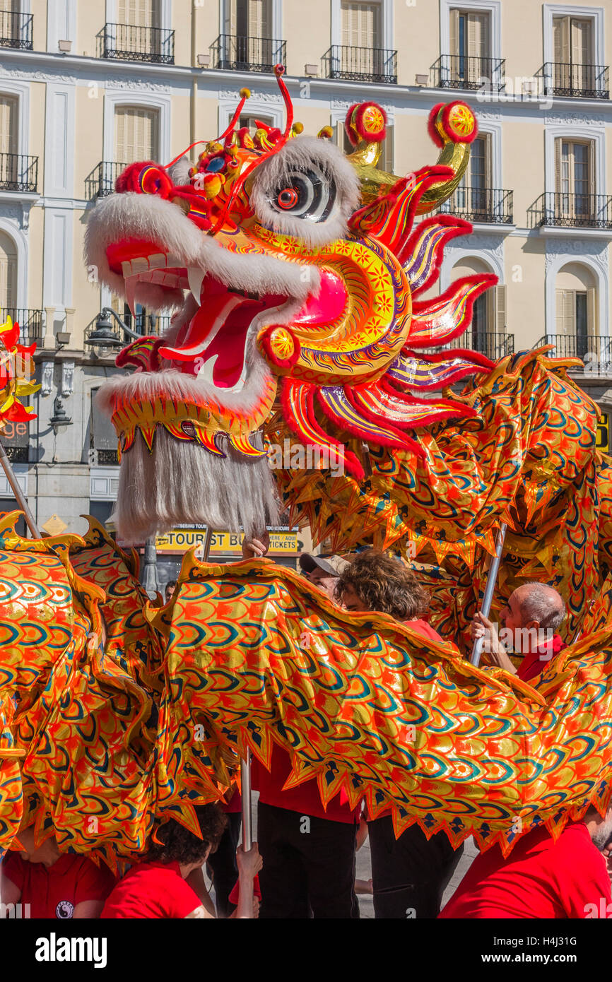 Chinese dragon dance in Puerta del Sol, Madrid, Spain Stock Photo - Alamy