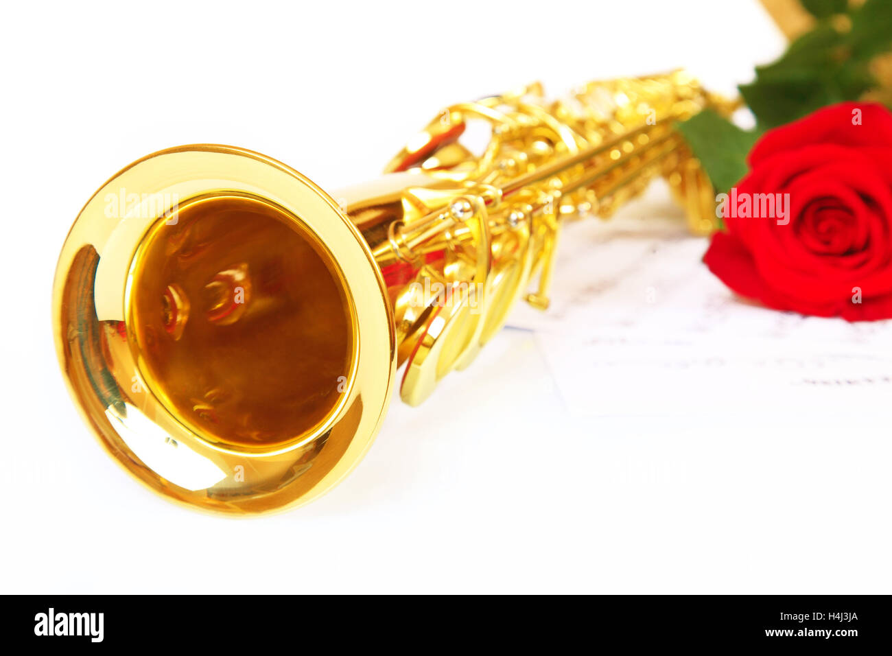 Musical notes and saxophone with red flower Stock Photo - Alamy