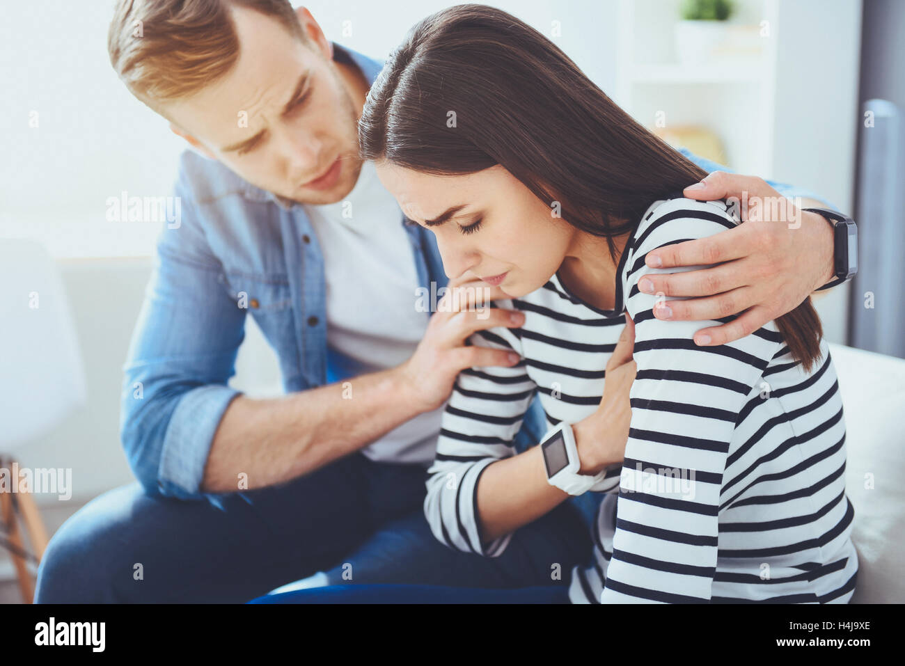 Beautiful young woman having heartache Stock Photo - Alamy