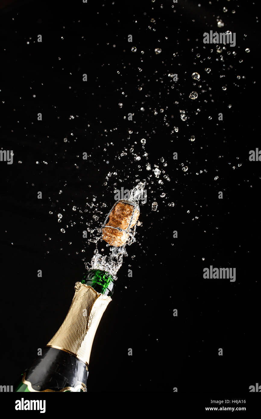 Champagne explosion and bright fountain of spray Stock Photo - Alamy