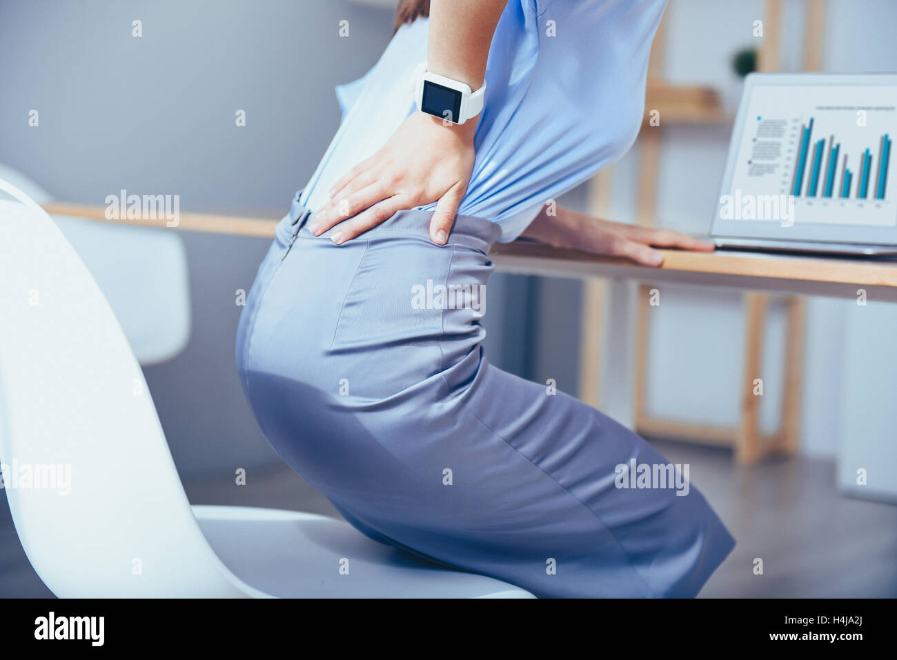 Backache tired unhealthy female worker hi-res stock photography and ...