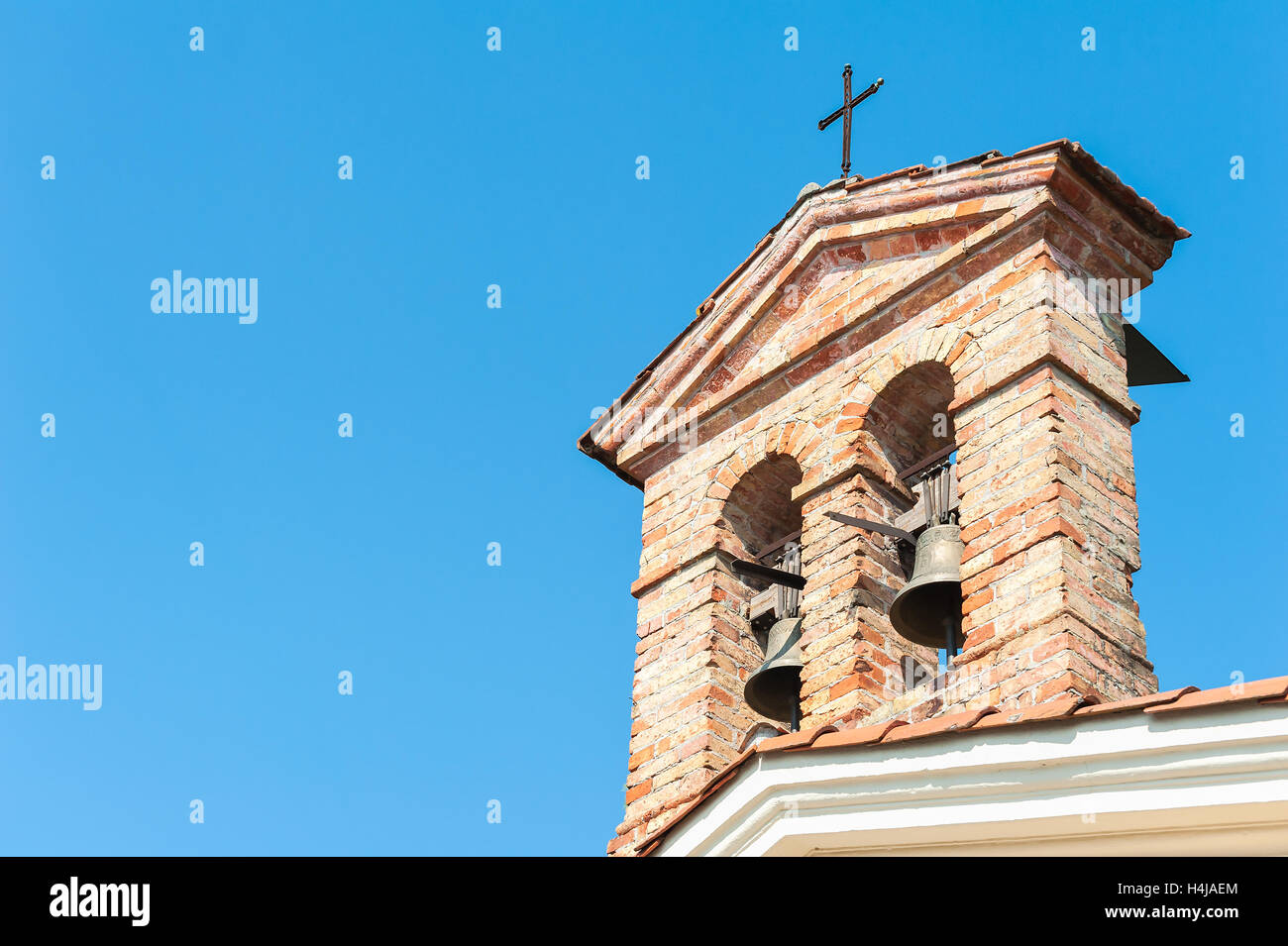 Small bell tower with a bell of a country church in the 14th century ...