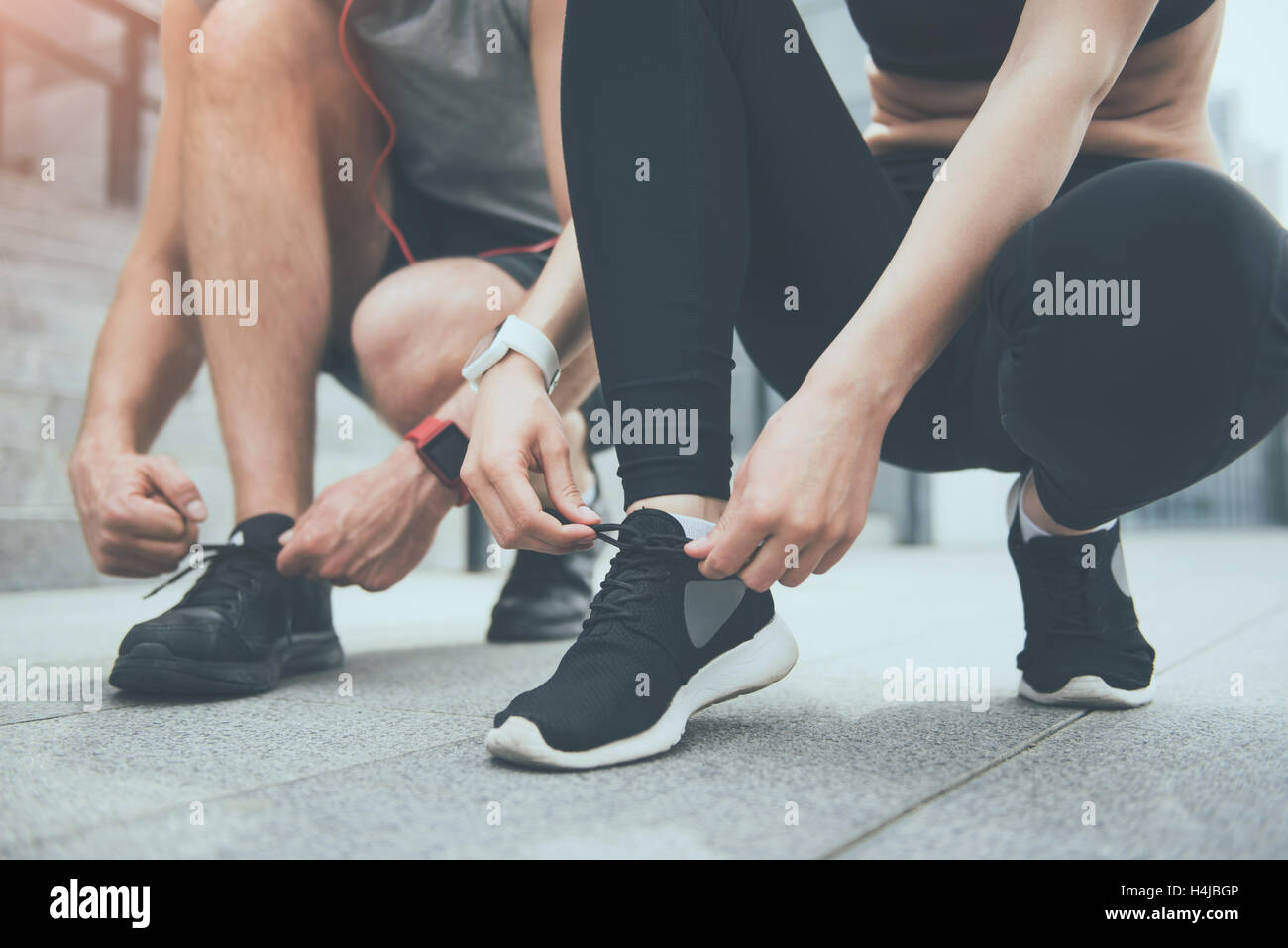 man and woman preparing for training Stock Photo - Alamy