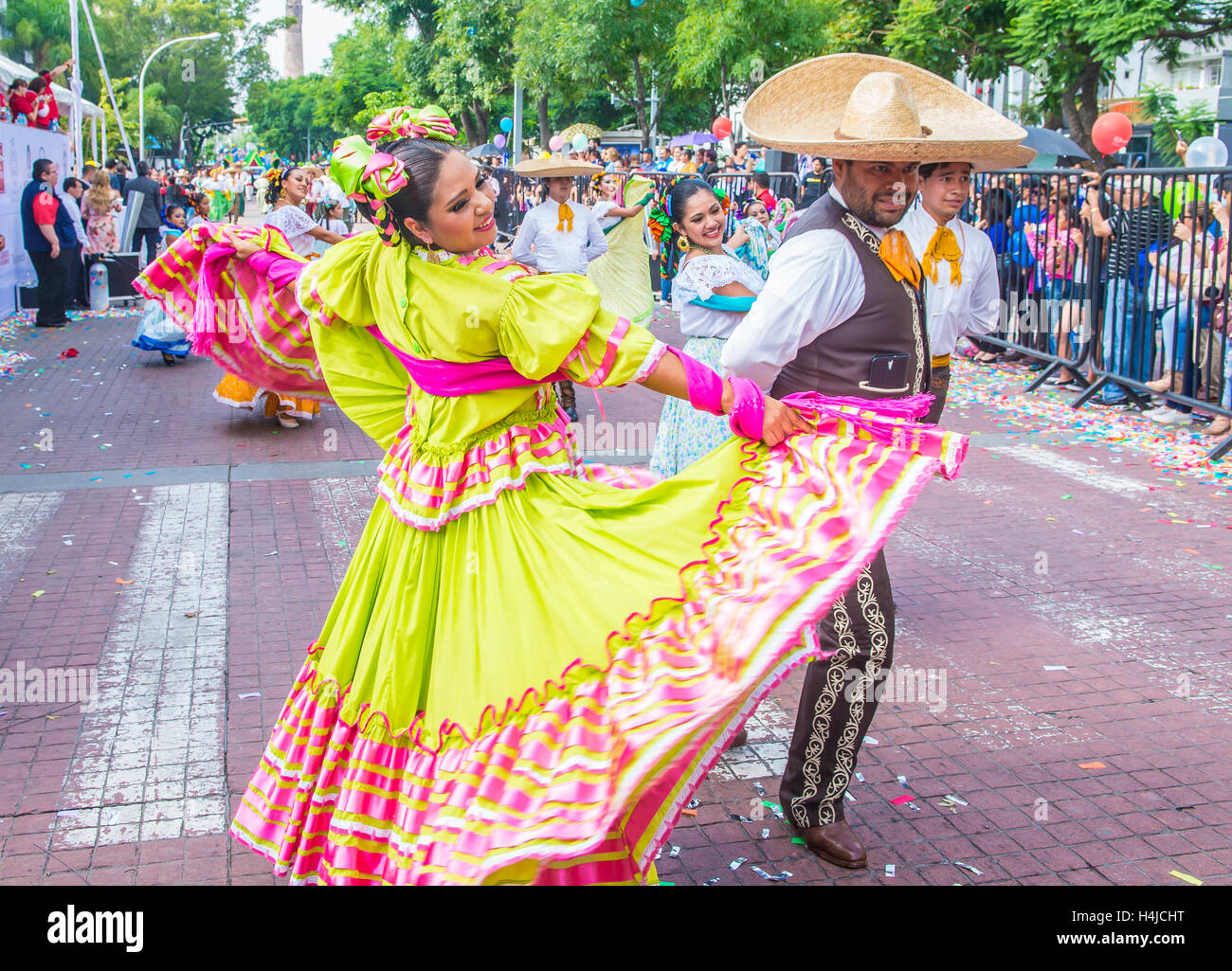 Participants in a parade during the 23rd International Mariachi ...
