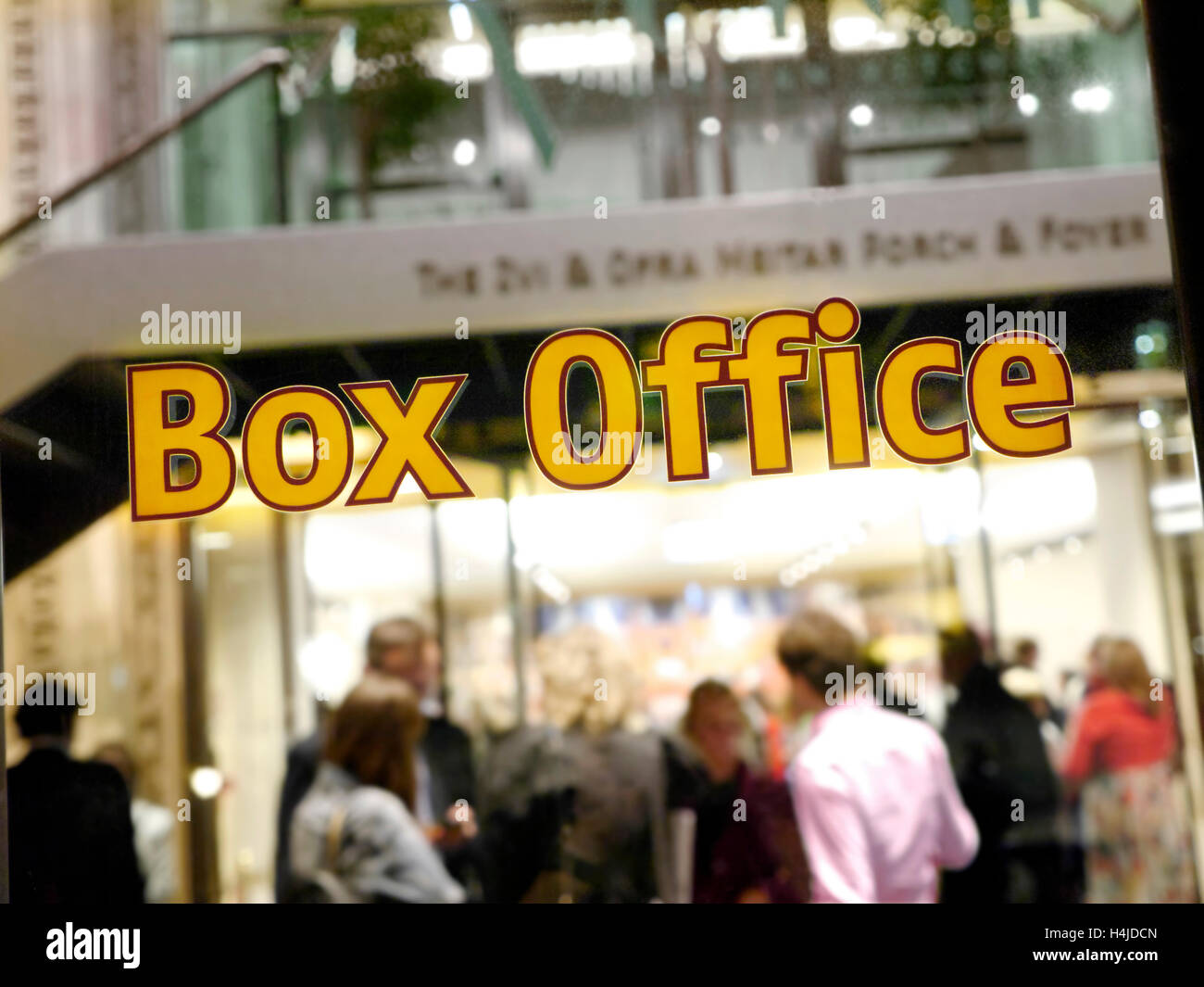 Queue here sign hi-res stock photography and images - Alamy