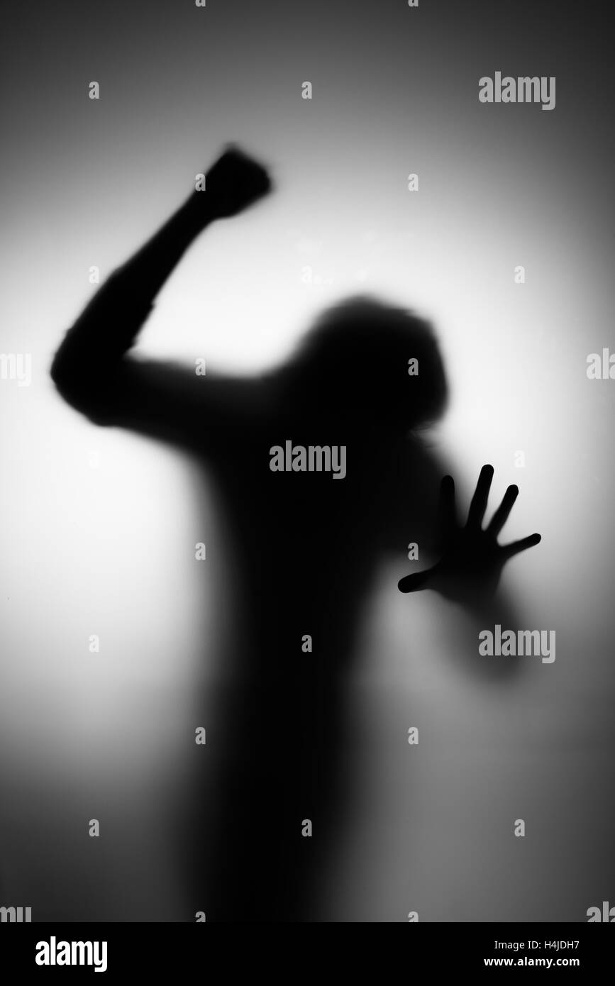 Silhouette man behind frosted glass hi-res stock photography and images ...