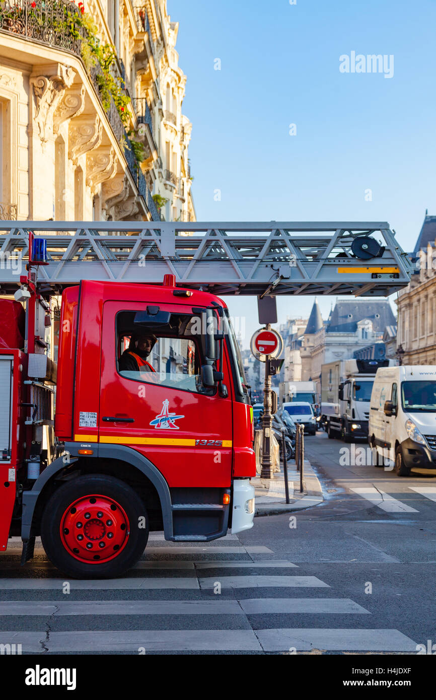 Paris, France - October 12, 2016: Fireman in his fire truck in the ...