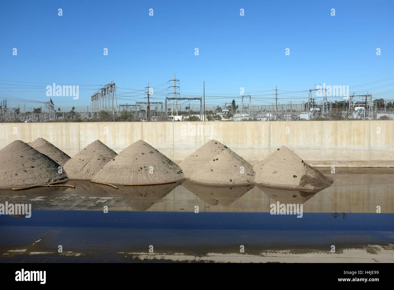 Santa Ana River is Orange County, California, Crews clean sand from the ...