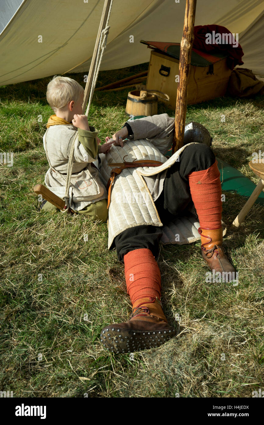 Family life in the 11th century in a reenactment of the 1066 Battle of ...