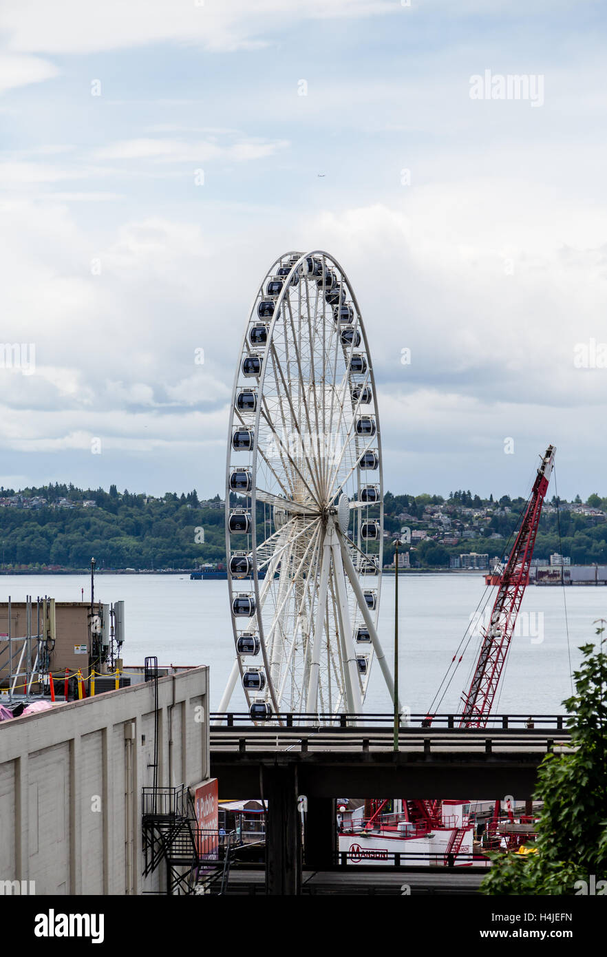Waterfront architecture of Seattle featuing the new ferris wheel Stock ...