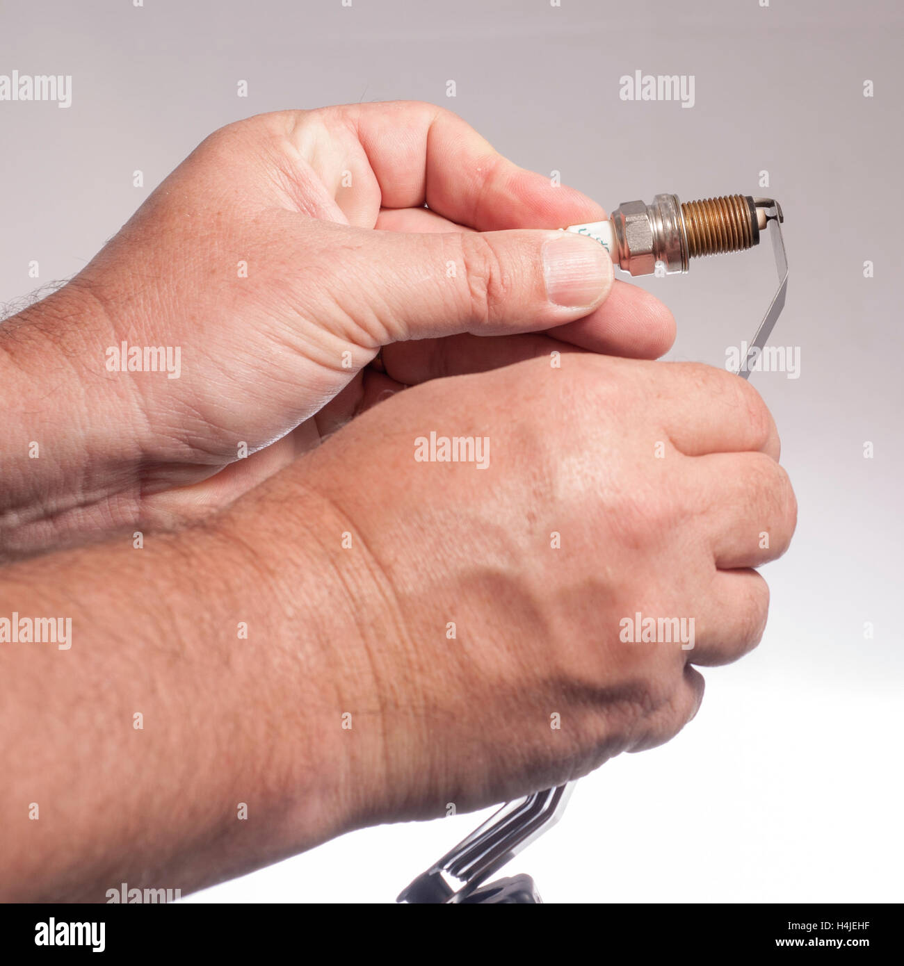 Spark plug gap tool hi-res stock photography and images - Alamy