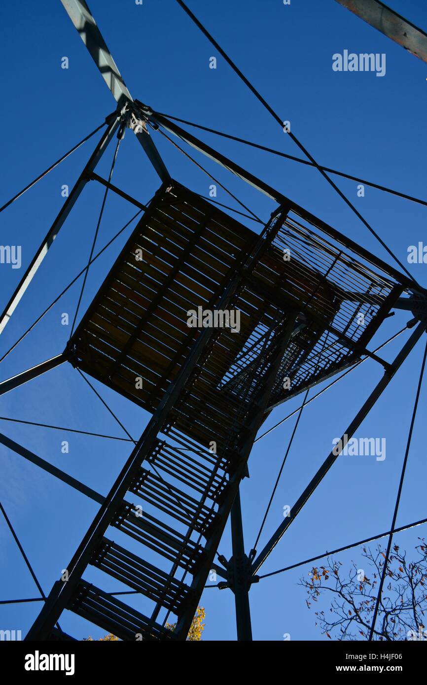 A fire tower/observation tower outlined by the sun on a clear day in Mt ...