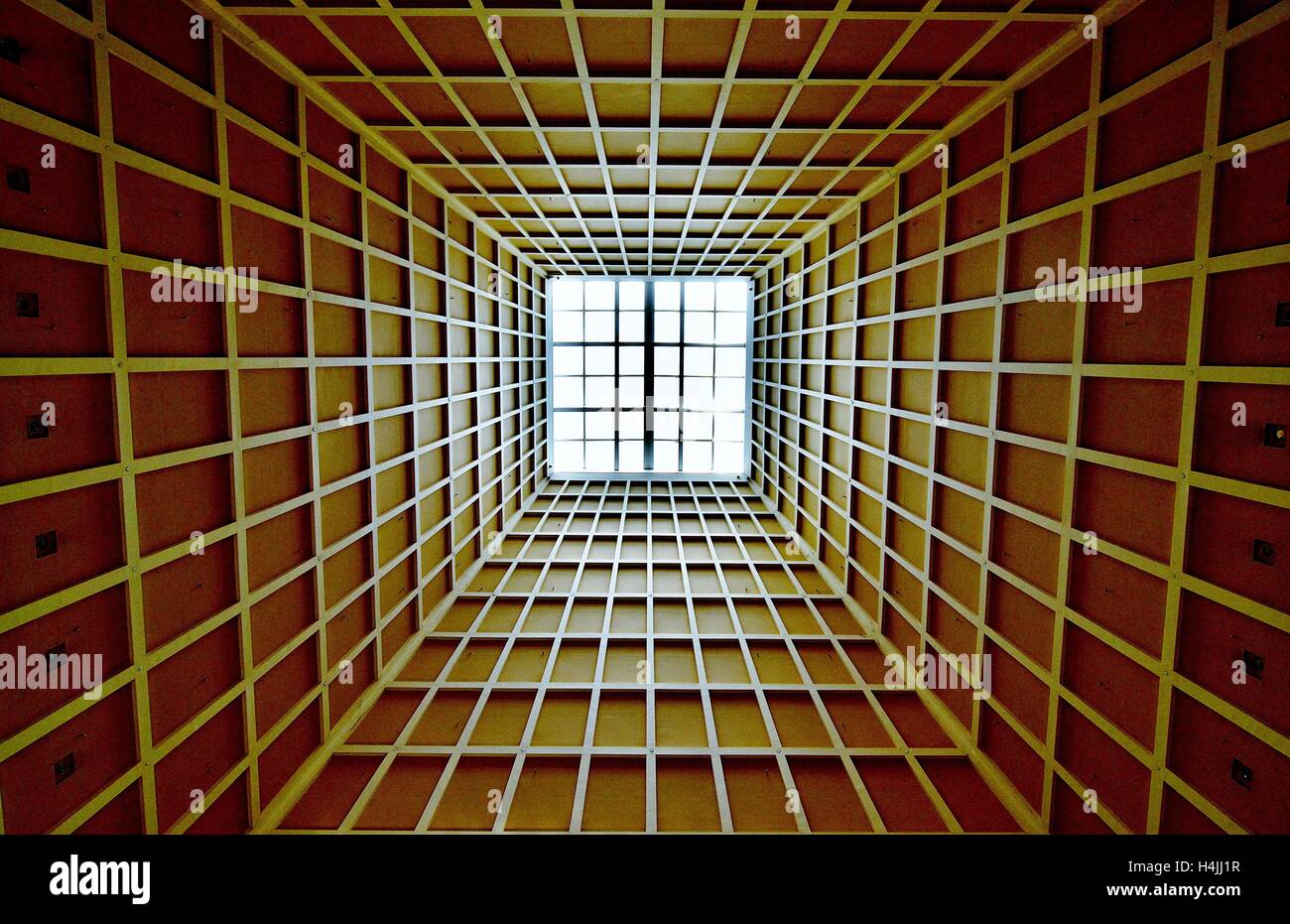 Abstract perspective of a high ceiling with vertical skylight with ...