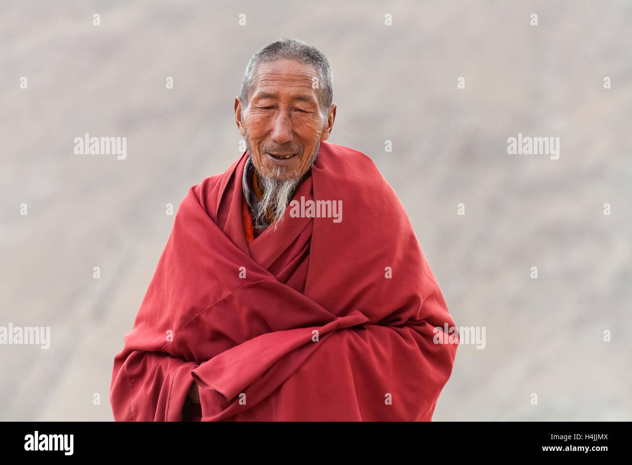 Portrait of a old monk Stock Photo - Alamy