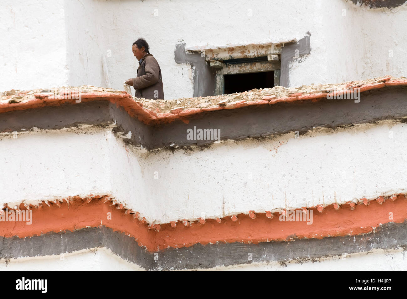 Tibetan man doing Kora (pilgrimage) round Great Jonang Kumbum Stock ...