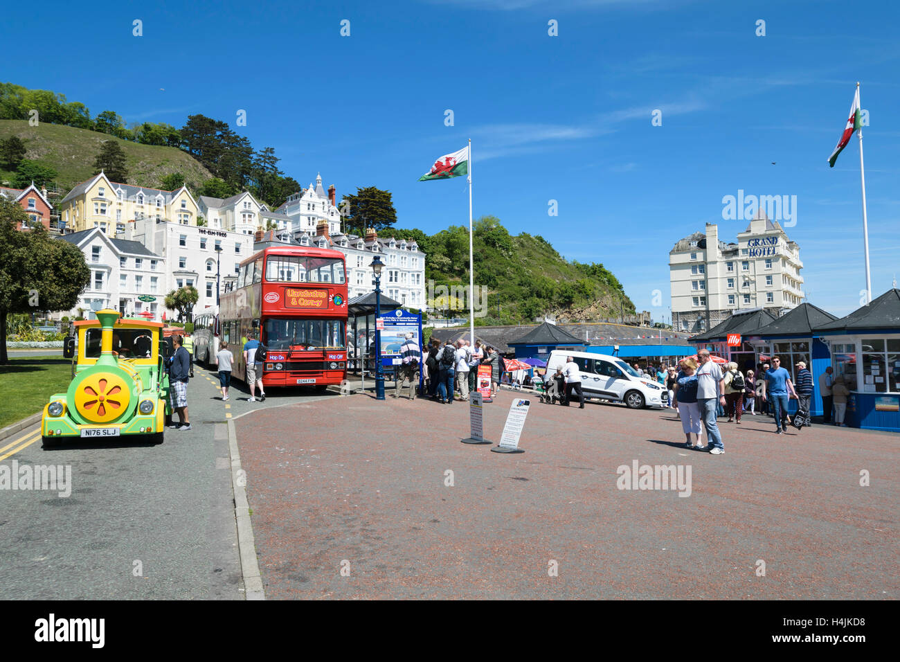 Llandudno promenade tour bus and tour train on the North Wales coast ...