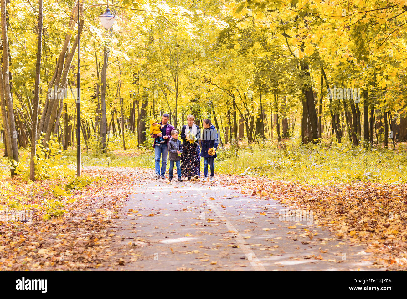 Family On Walk In Countryside Stock Photo - Alamy