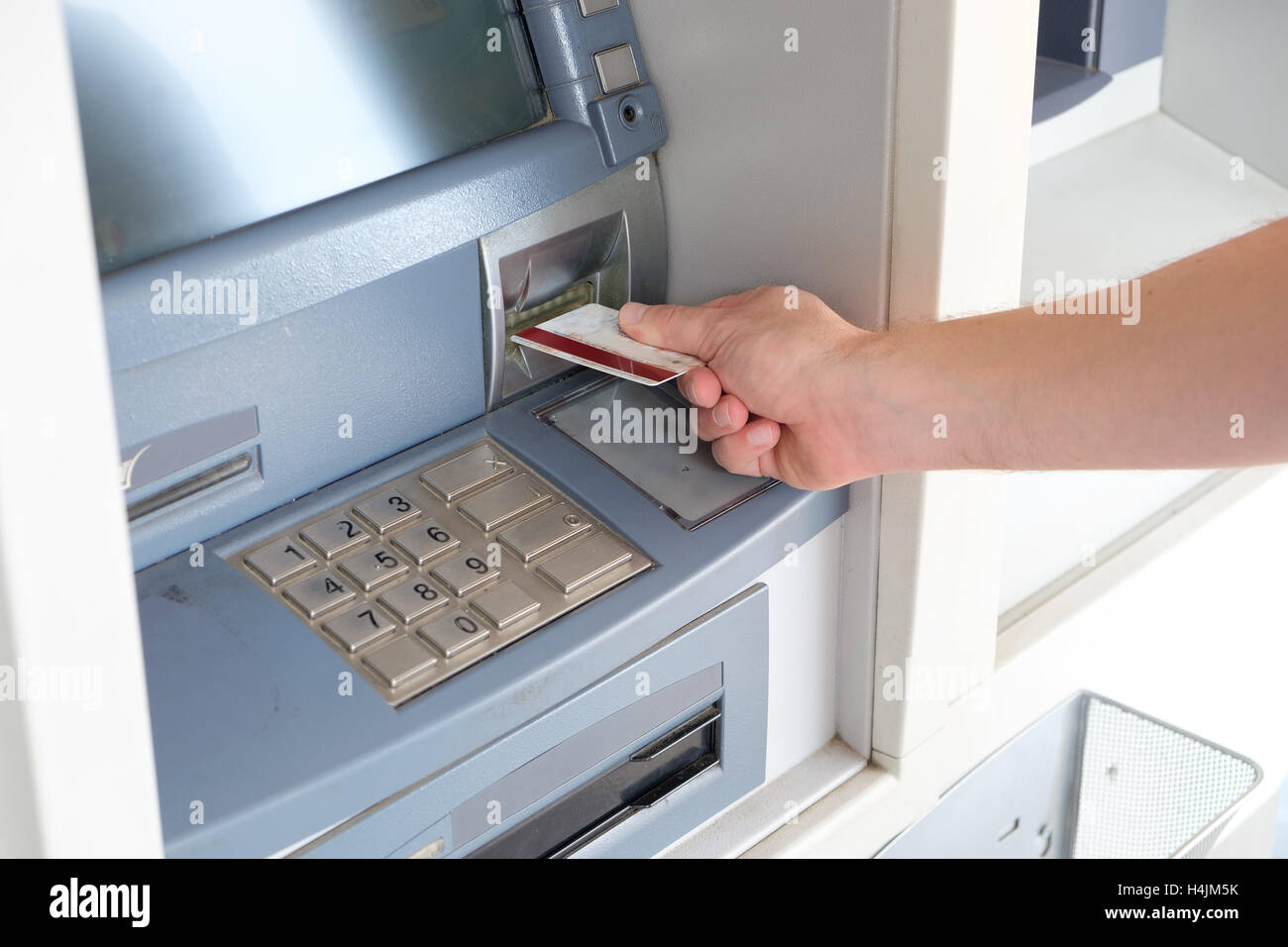 Inserting Credit Card In Atm High Resolution Stock Photography and ...