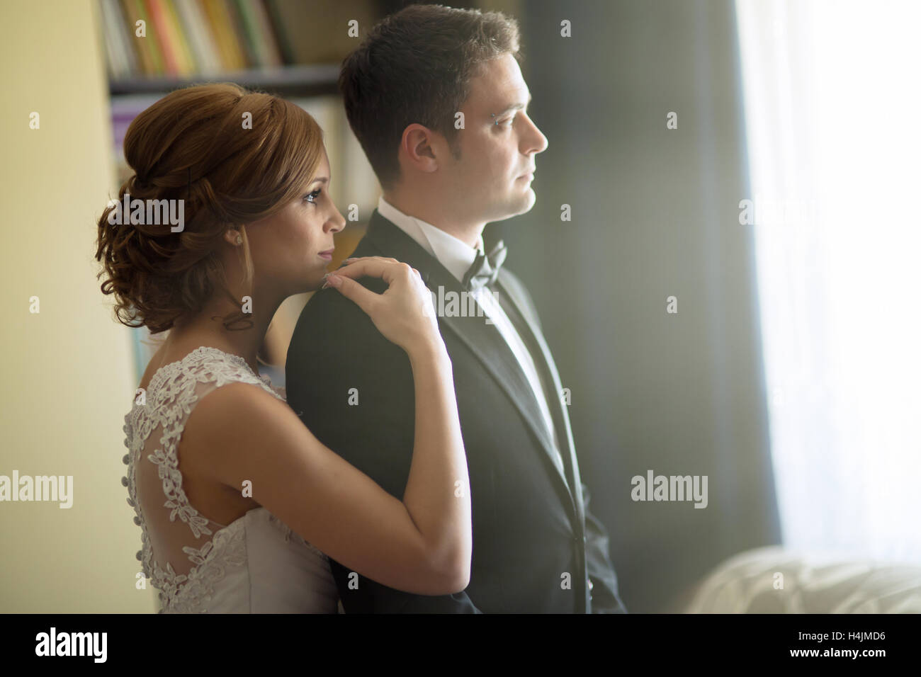 Bride leaning on shoulder hi-res stock photography and images - Alamy