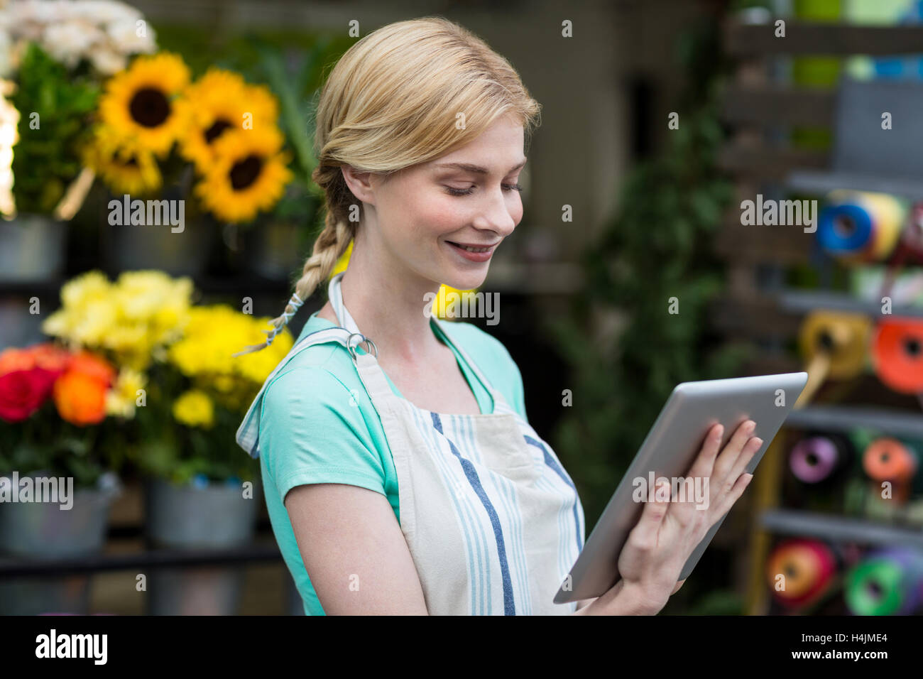 Attractive female worker using hi-res stock photography and images - Alamy