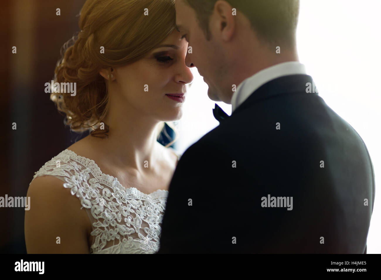 Bride and groom togetherness before ceremony Stock Photo - Alamy