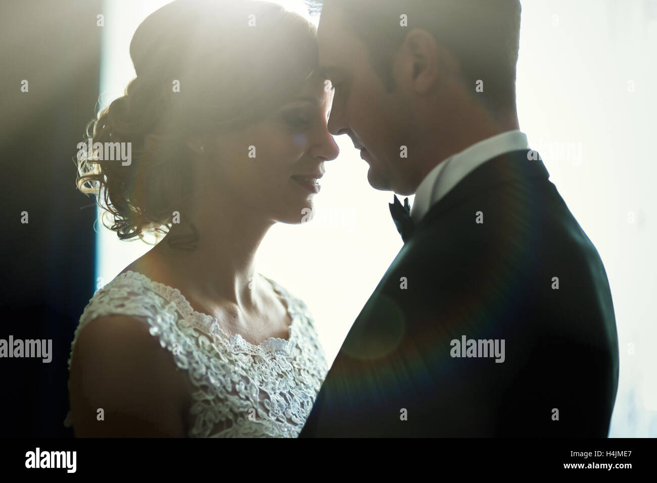 Bride and groom togetherness before ceremony Stock Photo - Alamy