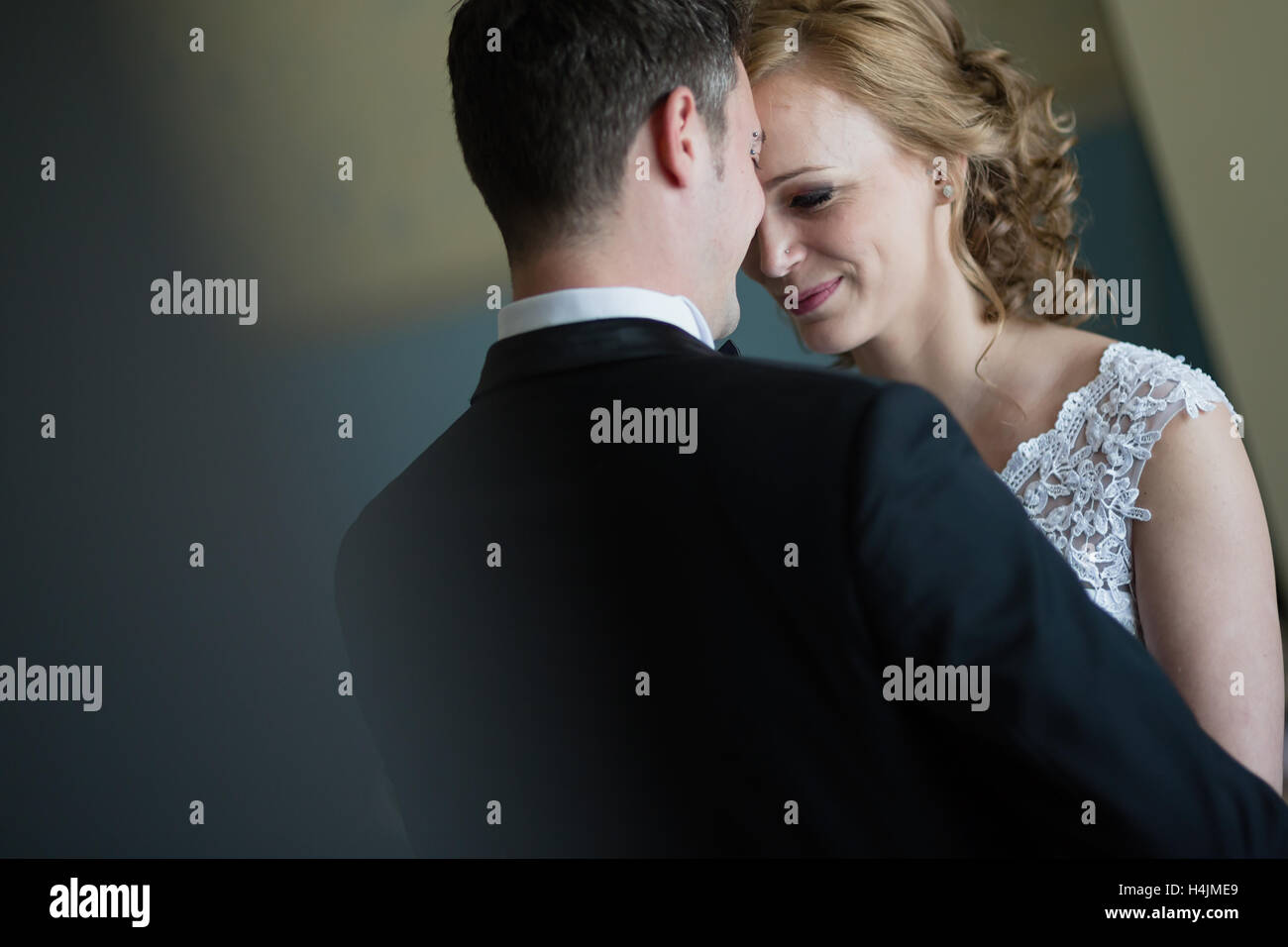 Bride and groom togetherness before ceremony Stock Photo - Alamy