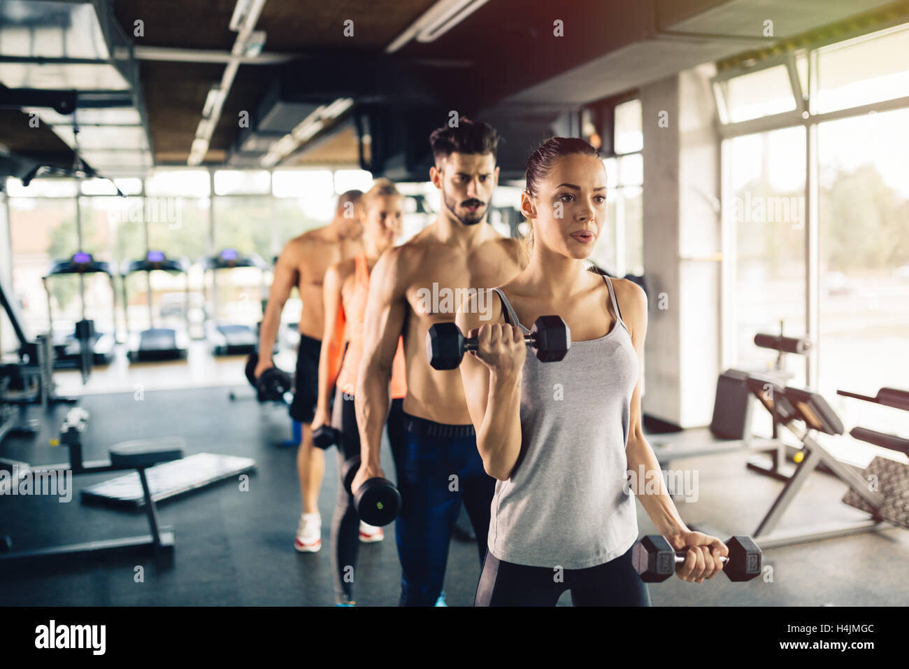 Group of people training in gym together Stock Photo - Alamy
