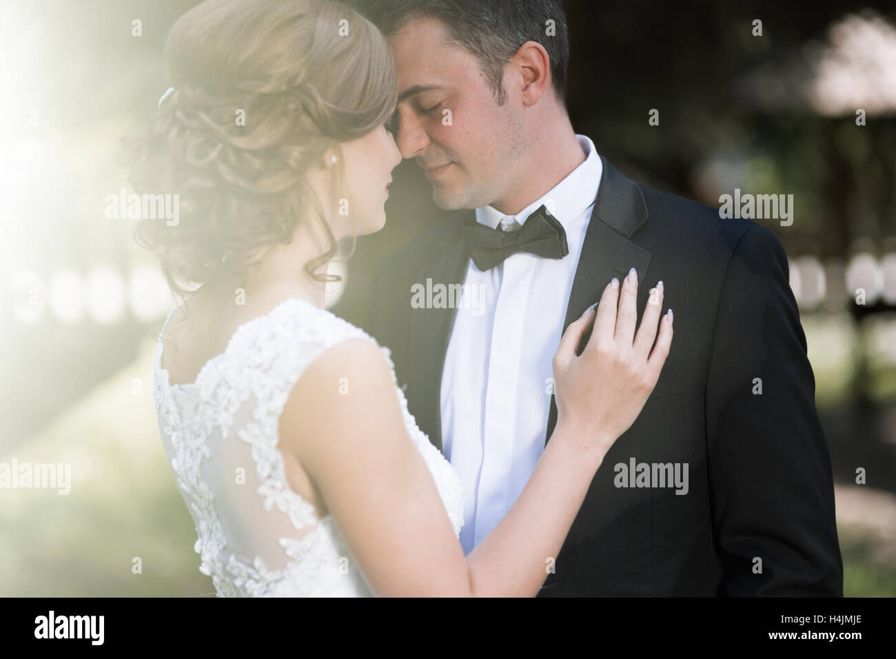 Beautiful bride and groom before wedding Stock Photo - Alamy
