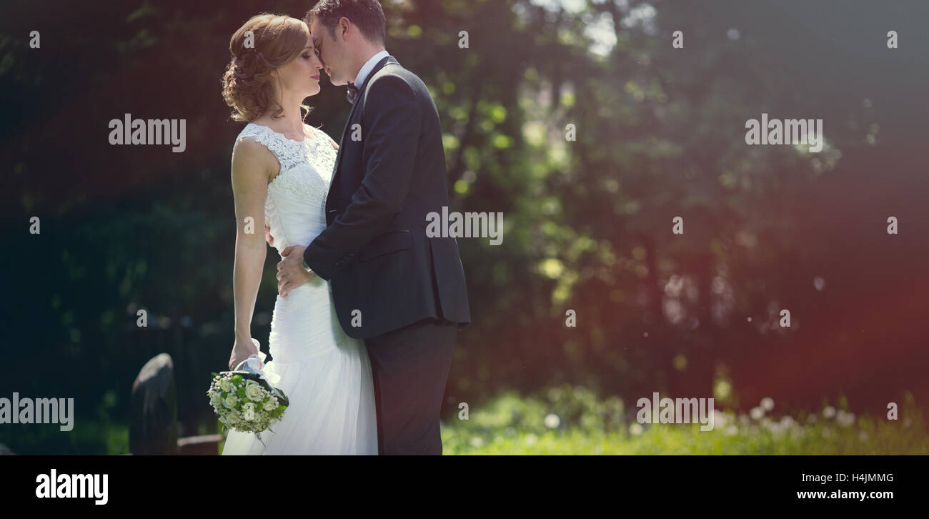 Beautiful bride and groom before wedding Stock Photo - Alamy