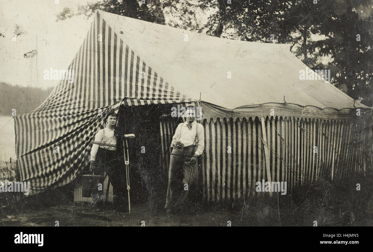Standing in front of a tent hi-res stock photography and images - Alamy