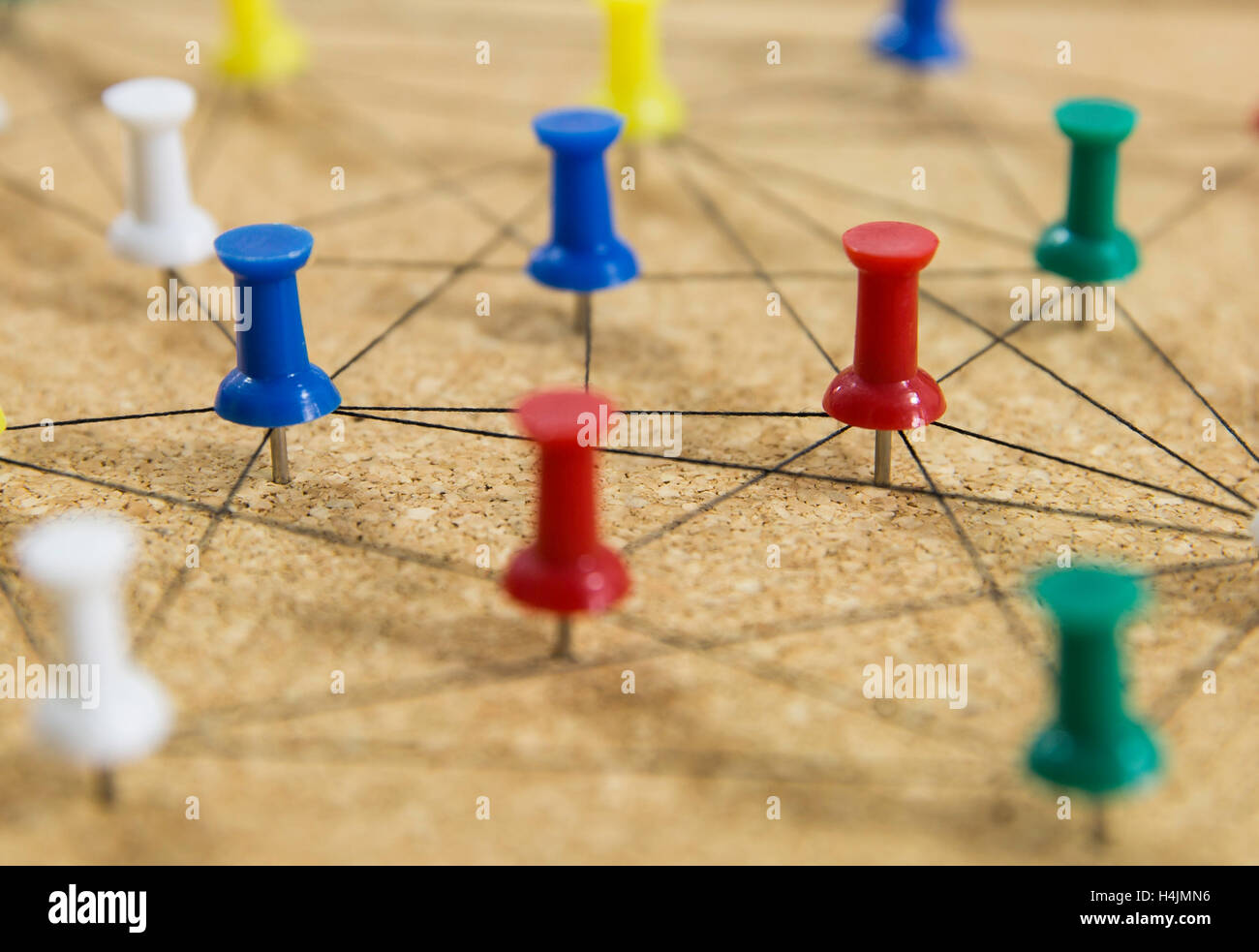 colorful pins on board, connection concept Stock Photo - Alamy
