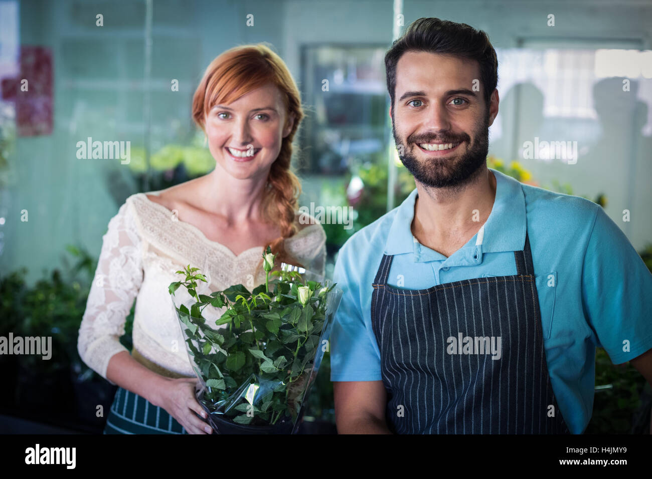 Couple holding flower hi-res stock photography and images - Alamy