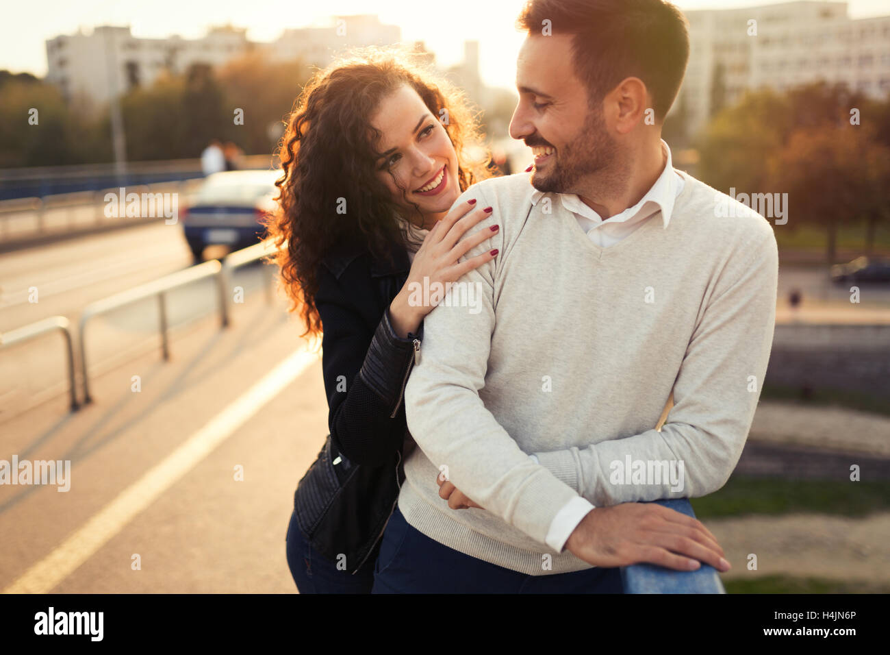 Beautiful couple bonding together in city Stock Photo - Alamy
