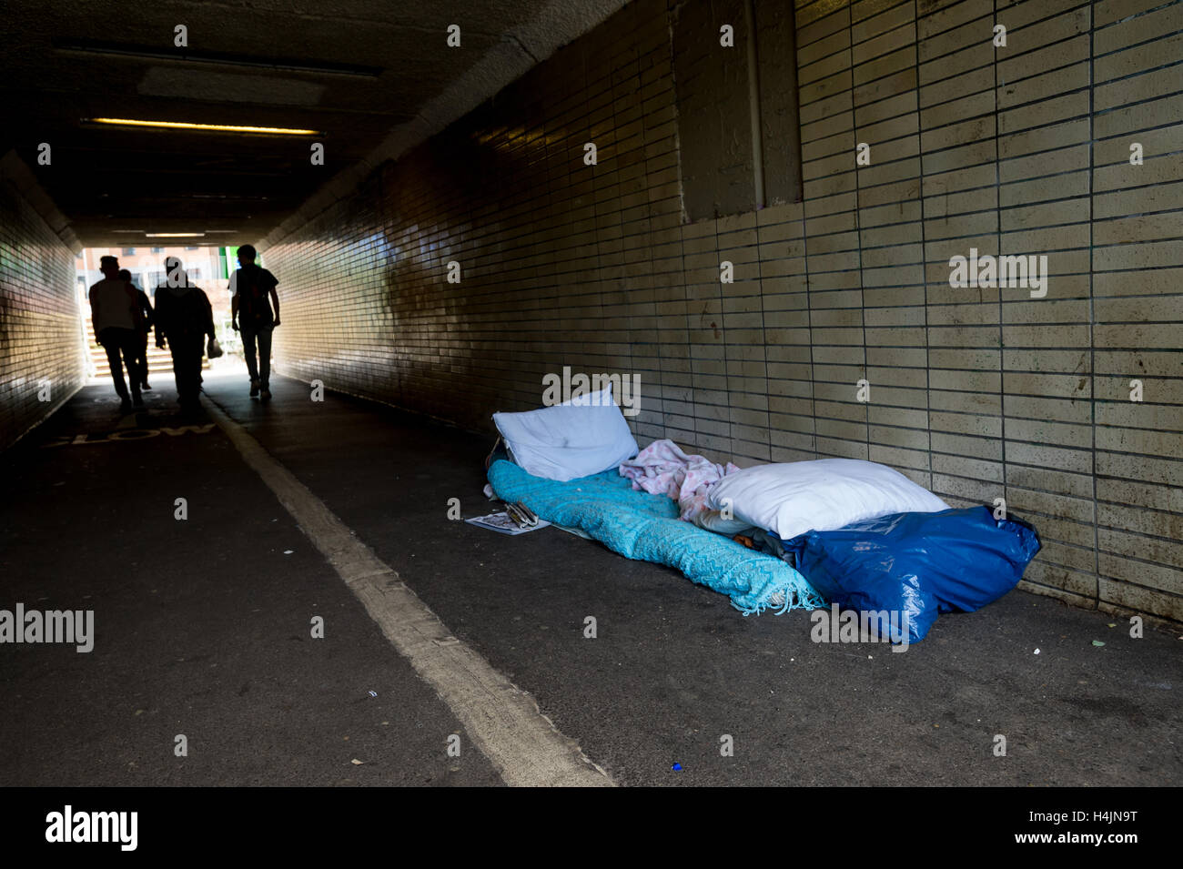 A homeless couple leave their bedding in an underpass in Sheffield ...