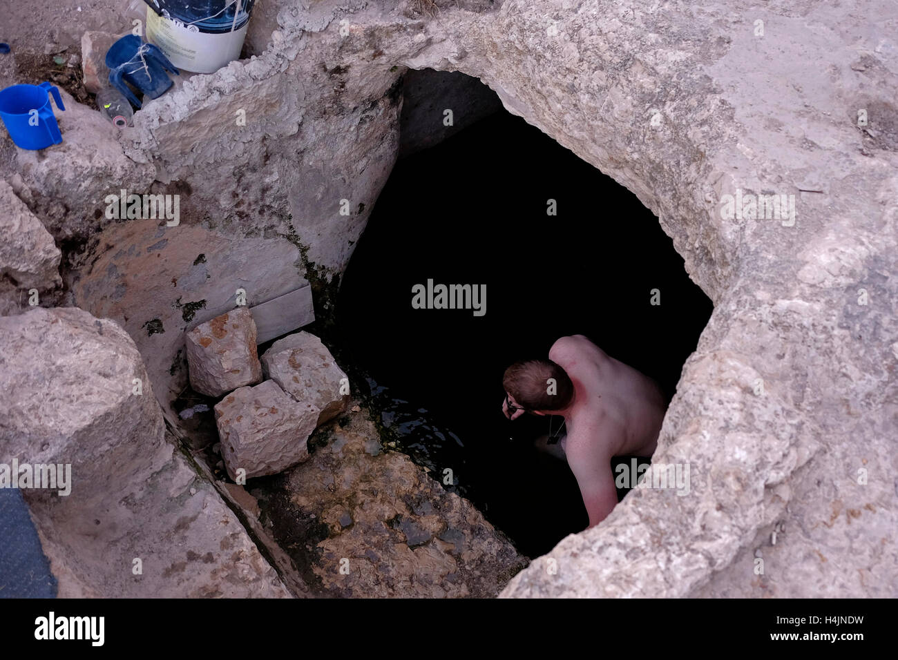 An Israeli religious bath inside an underground cistern in Mount Zion ...