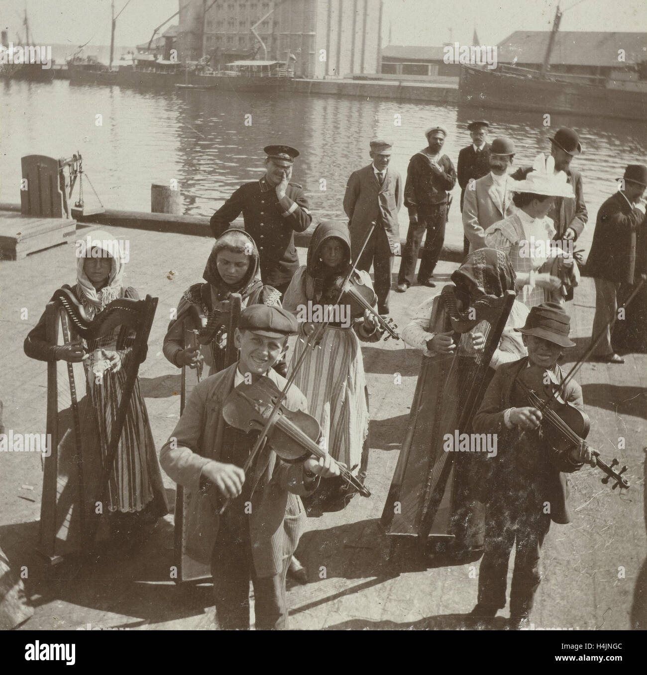 Children playing musical instruments hi-res stock photography and ...