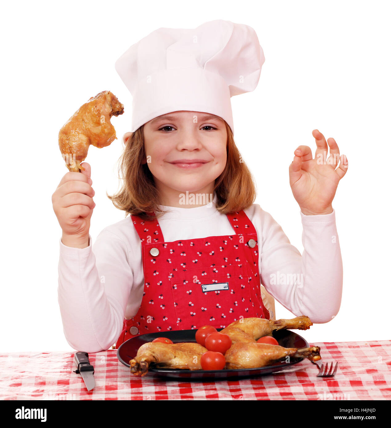 little girl cook with chicken drumstick Stock Photo - Alamy