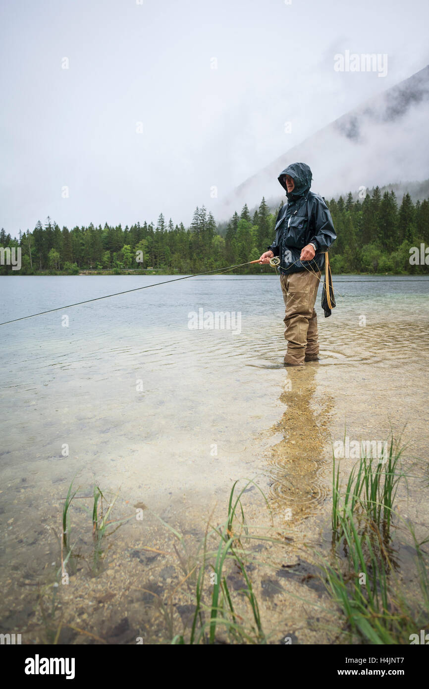A man fishing on Hintersee. Upper Bavaria. Germany Stock Photo - Alamy