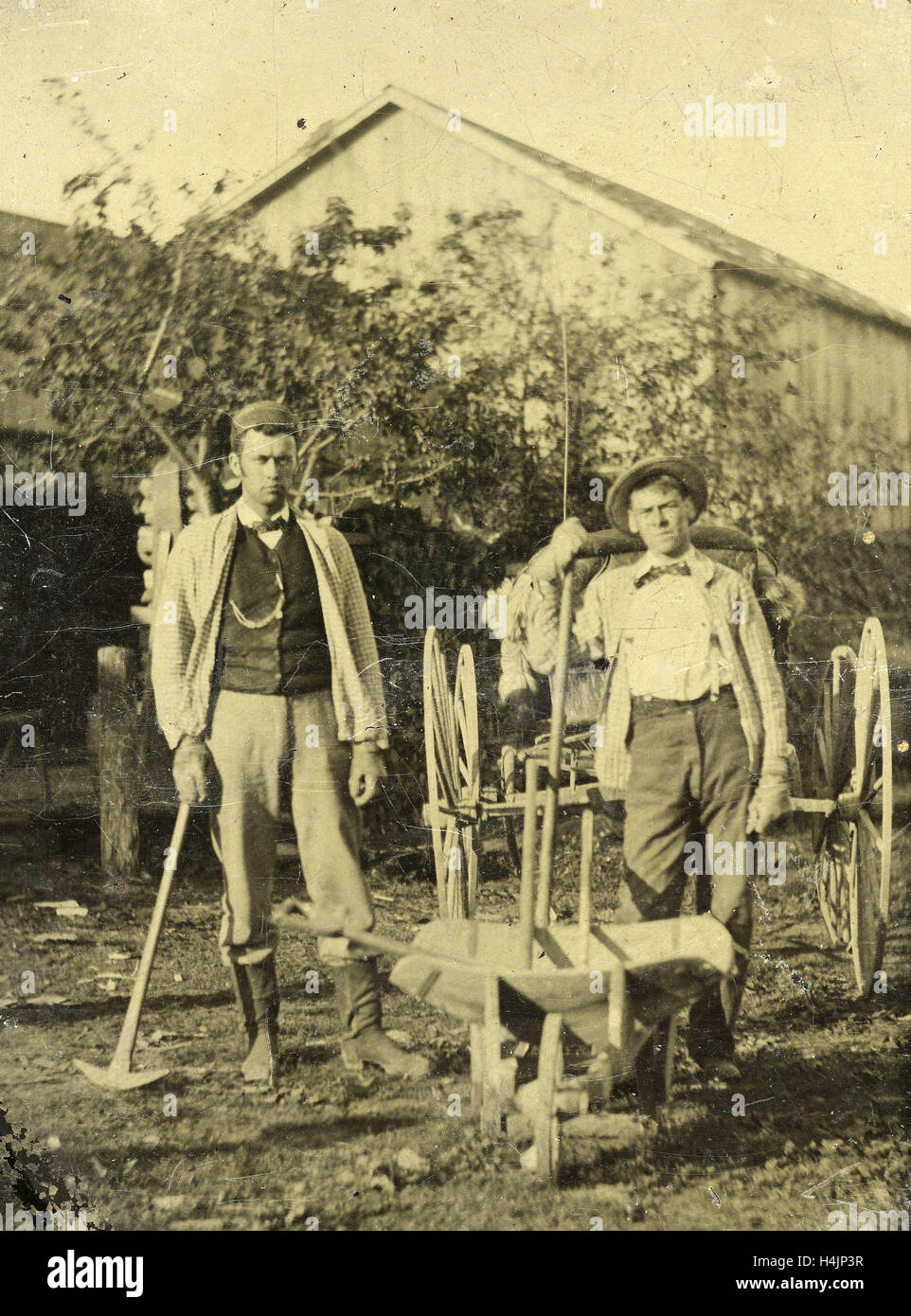 Two men with tools, a wheelbarrow and cart, Anonymous, 1880 - 1910 ...