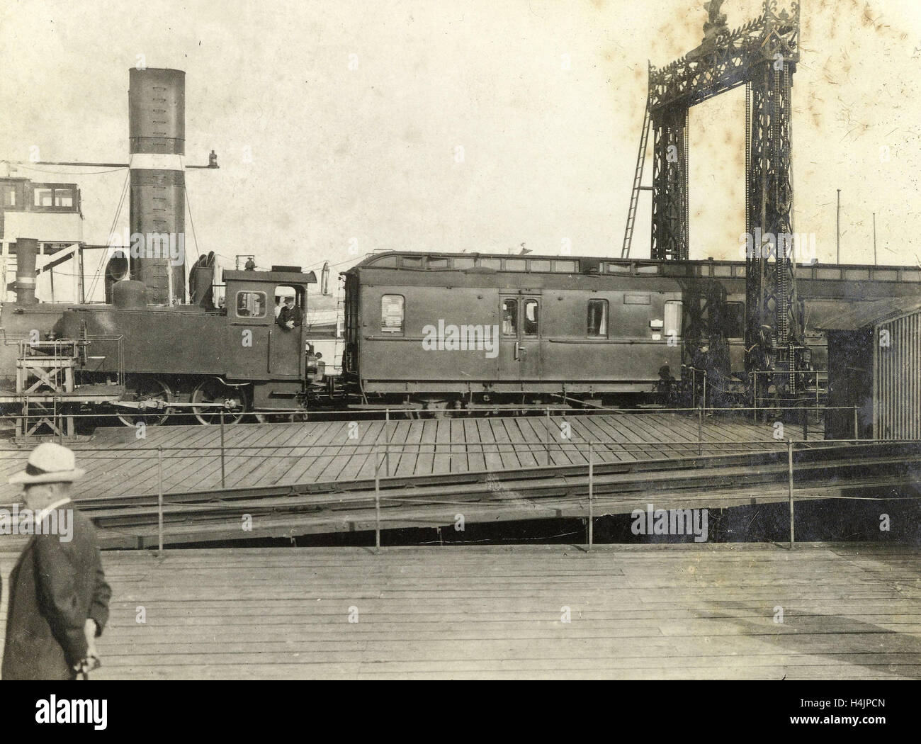 Locomotive and train at a railway yard, Anonymous, c. 1900 Stock Photo ...