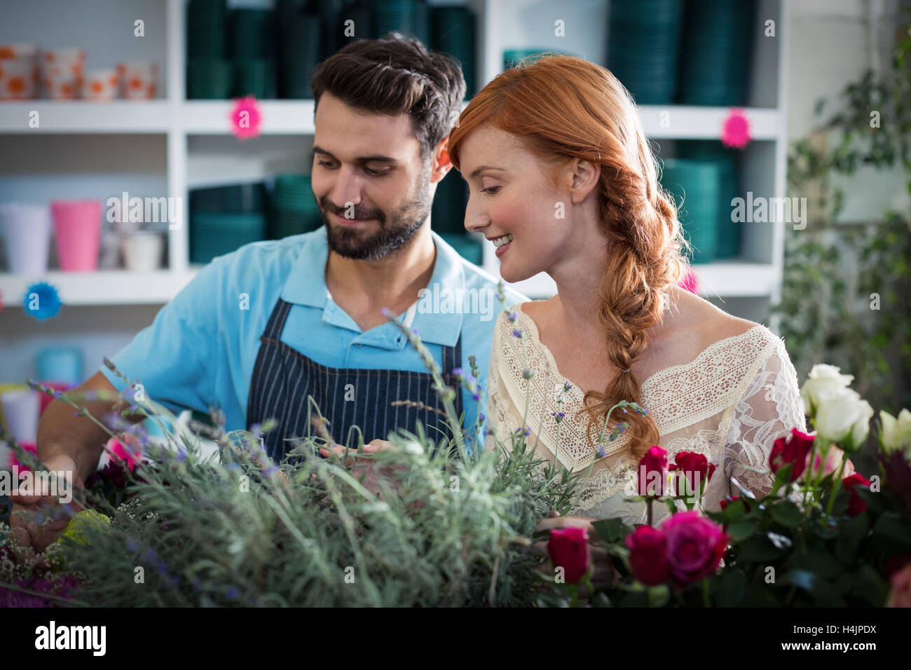 Couple with flowers hi-res stock photography and images - Alamy