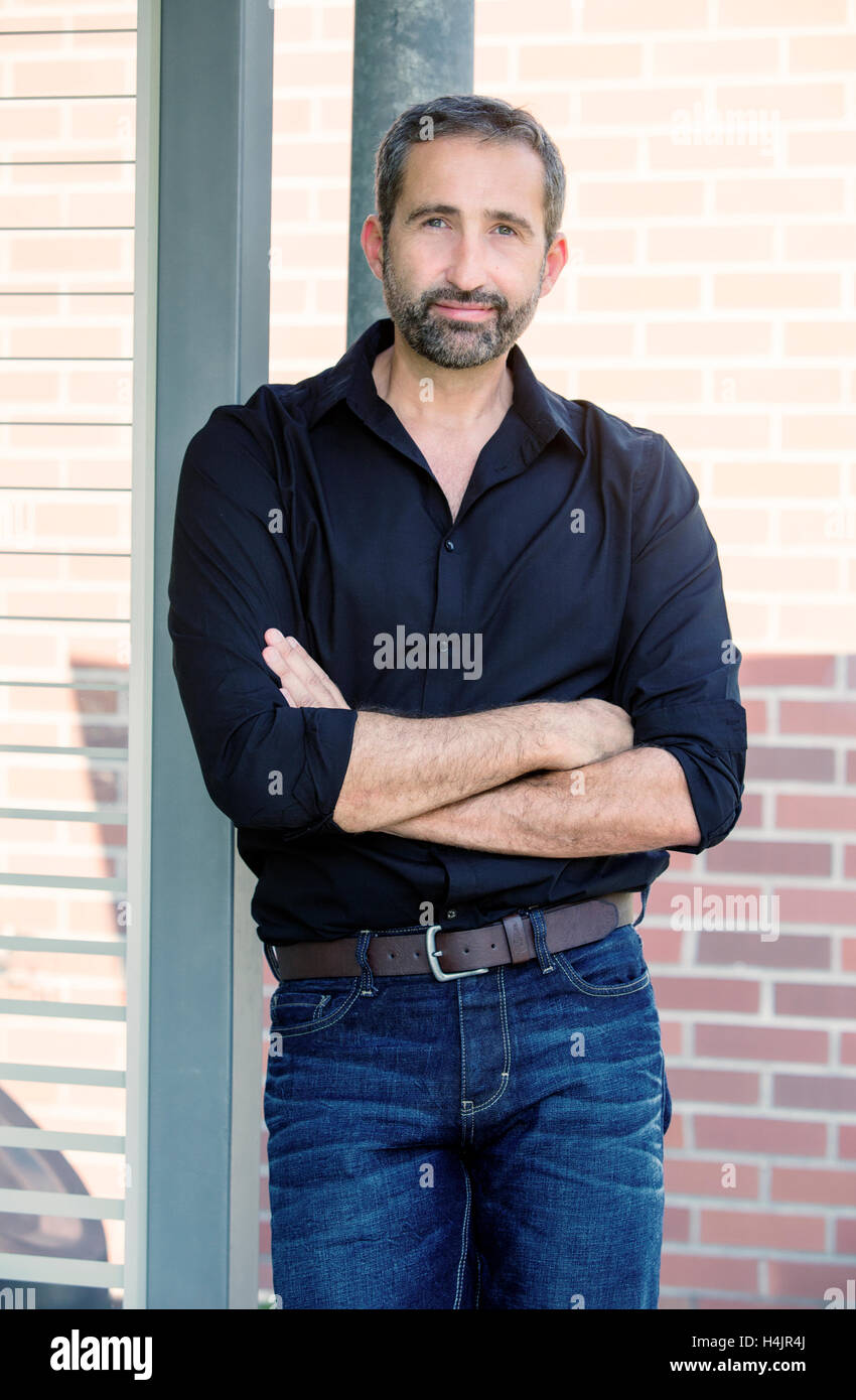 portrait of handsome man in his 40s standing outside Stock Photo - Alamy