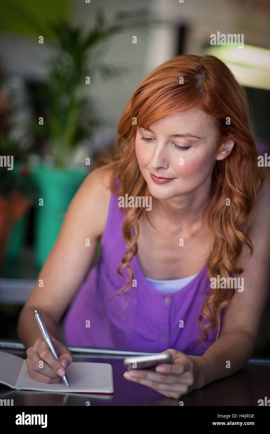 Adult notebook writing hi-res stock photography and images - Alamy