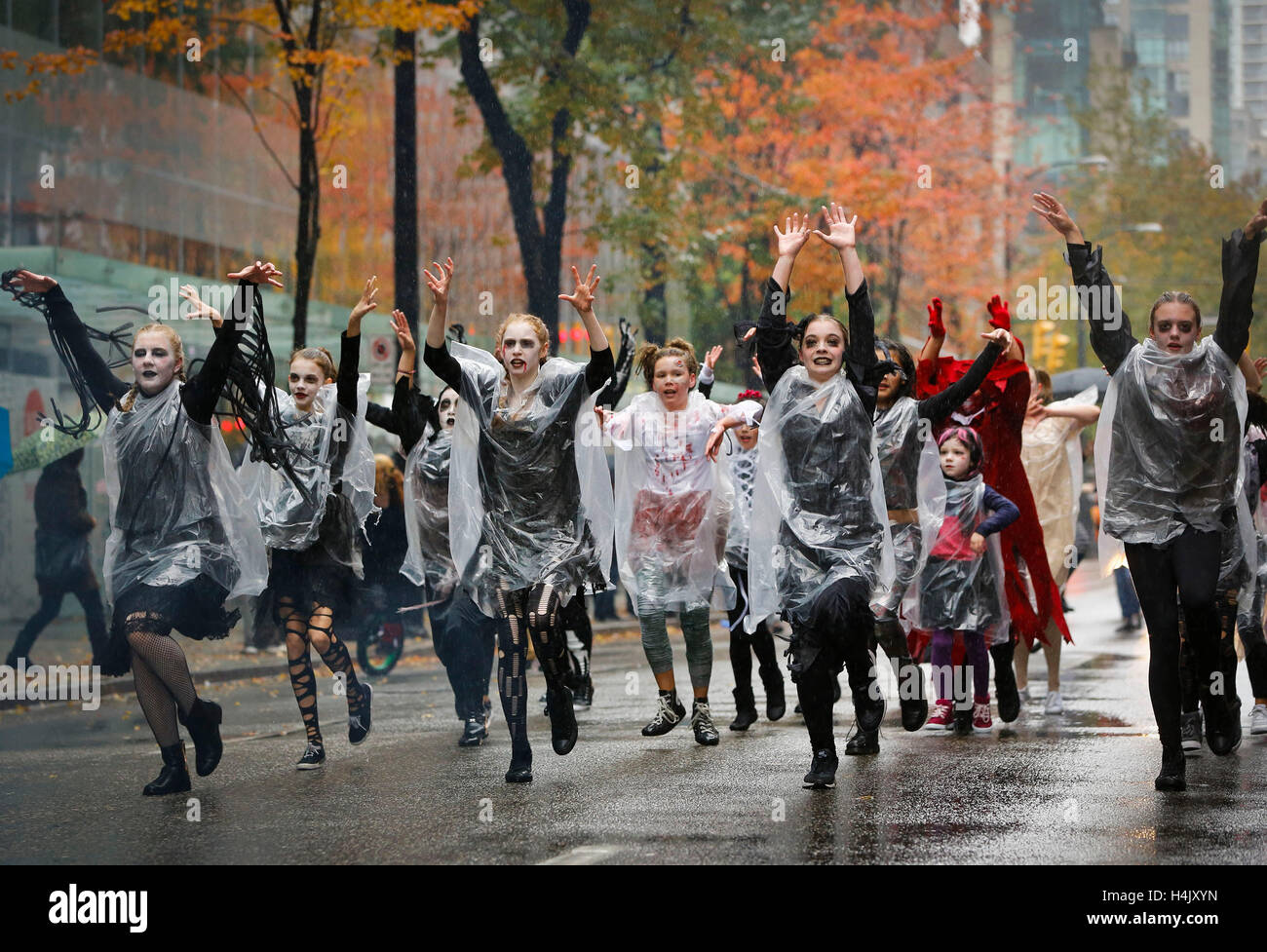 Vancouver, Canada. 16th Oct, 2016. Performers in costumes attend the ...