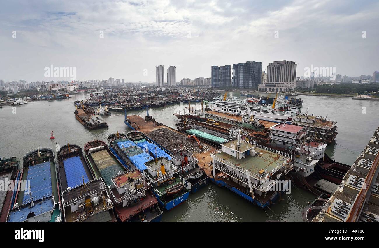 Haikou, China's Hainan Province. 17th Oct, 2016. Vessels are anchored ...