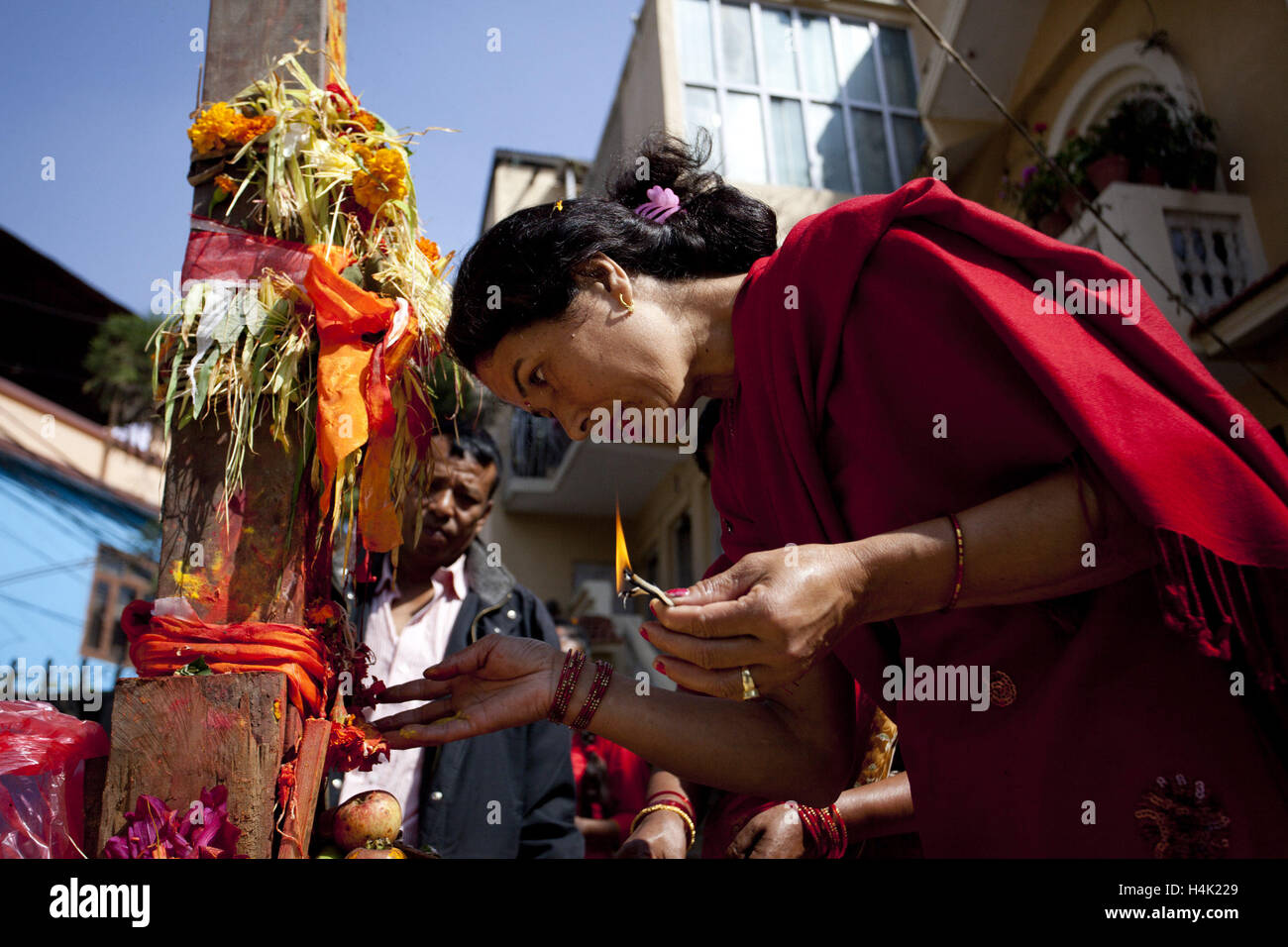 Kathmandu, Nepal. 17th Oct, 2016. A devotee offers prayers during a ...