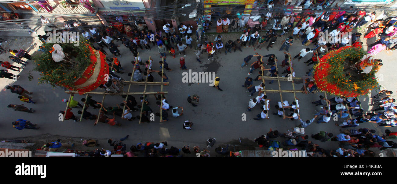 Kathmandu, Nepal. 17th Oct, 2016. Local people carry traditional ...