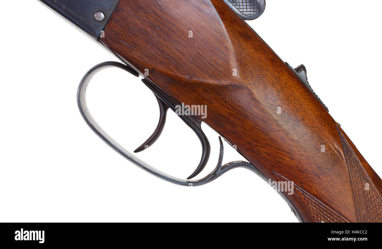 Closeup of the two triggers on an old shotgun isolated on white Stock ...
