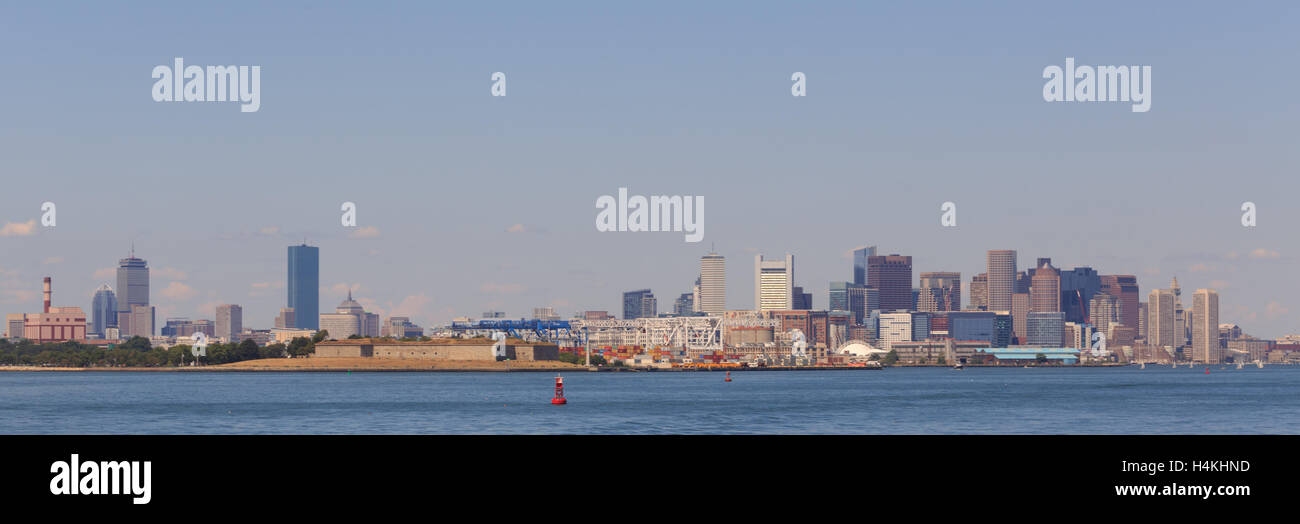 A panoramic photograph of the Boston Skyline, as seen from a boat on ...